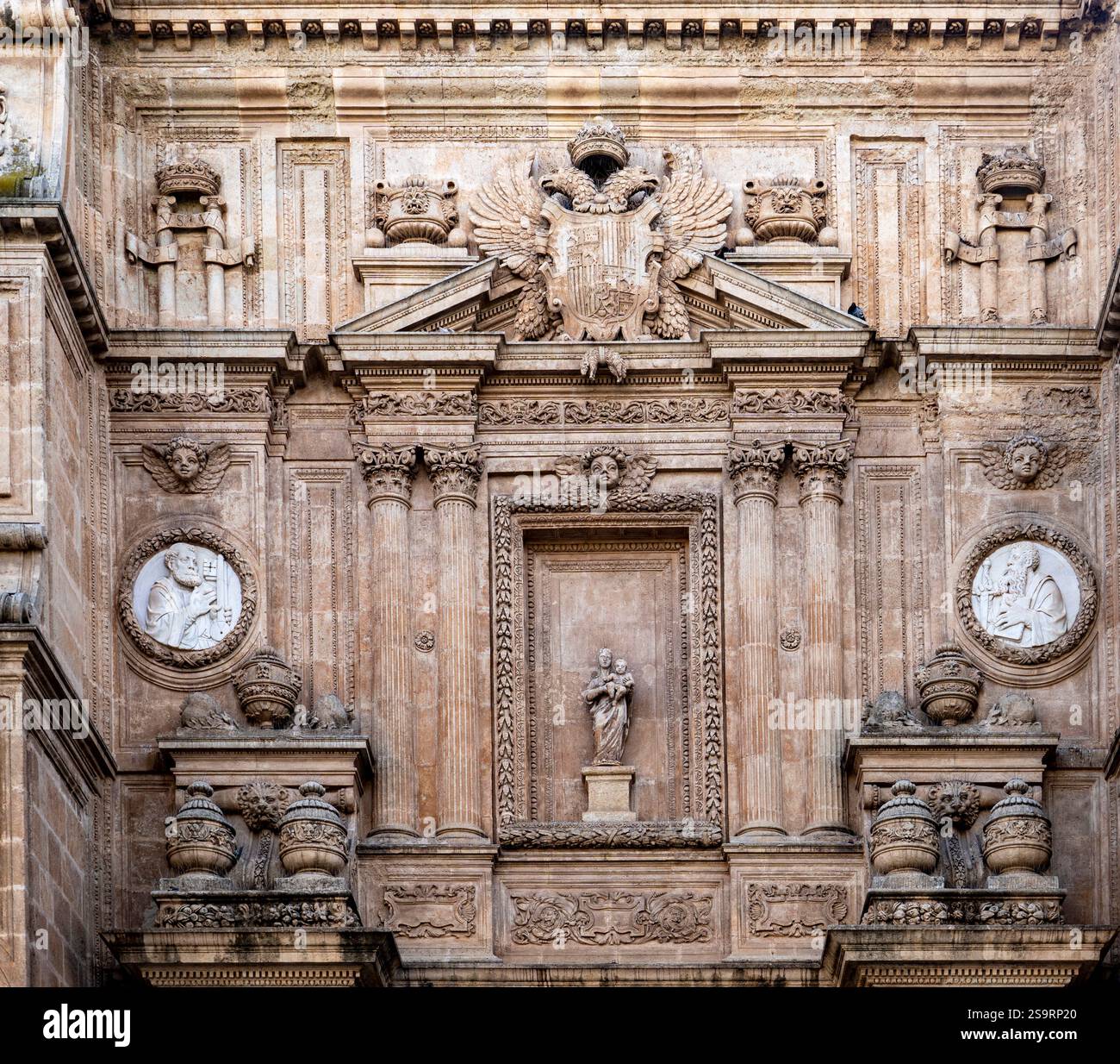 A detailed architectural facade featuring intricate stone carvings ...