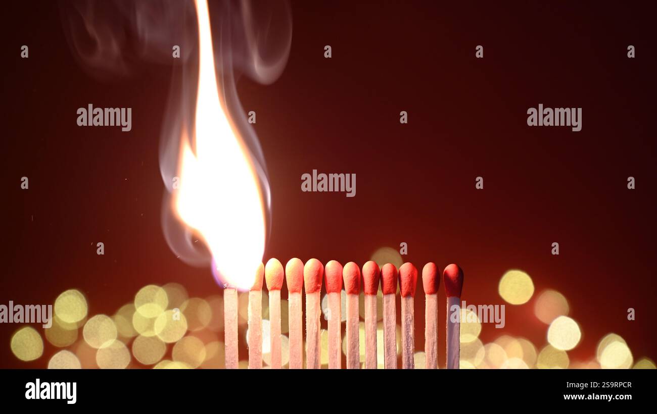 Burning matches on new year eve of twelve month Stock Photo - Alamy