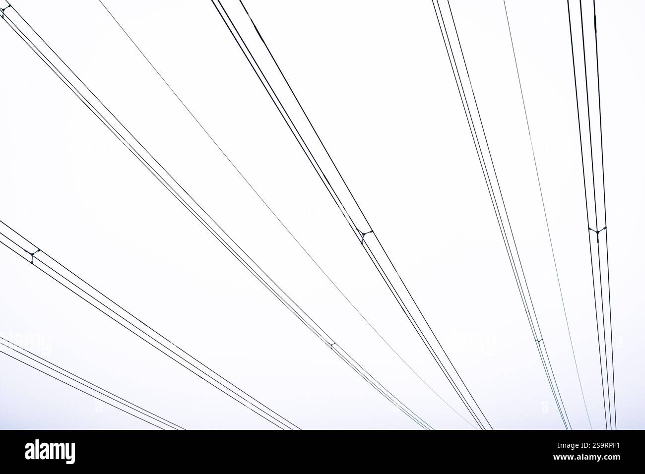 High voltage electric cables on sky background Stock Photo - Alamy