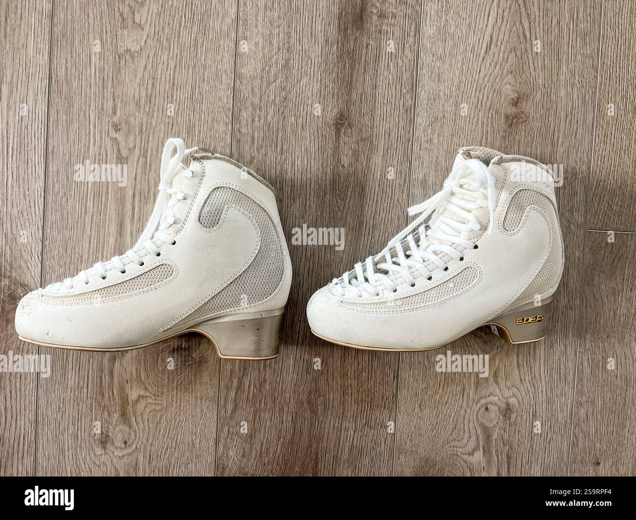 Edea Ice Fly figure skates on wooden floor Stock Photo - Alamy