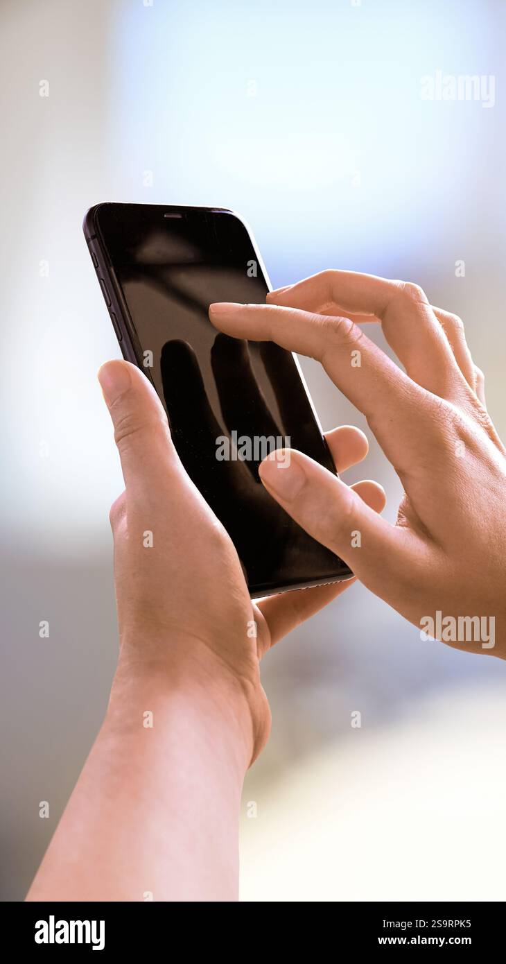 Business woman teenager with mobile phone smartphone posting, chatting ...