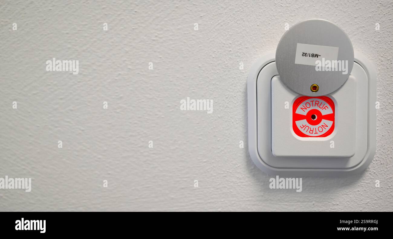 Emergency button in a building, part of building services engineering ...