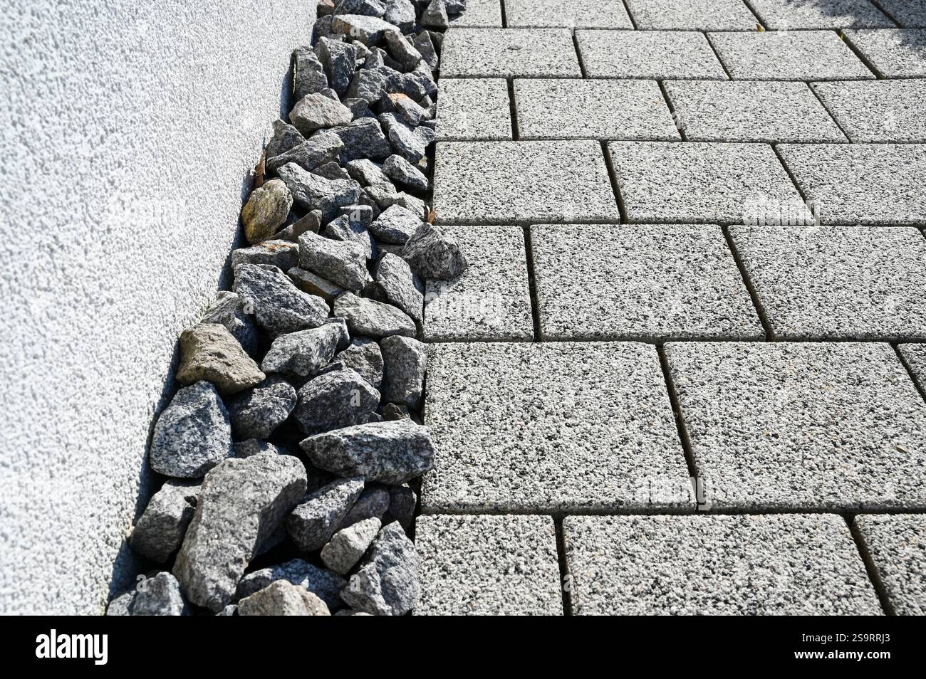 Granite stone block paving background. Paving work on a sidewalk, yard ...