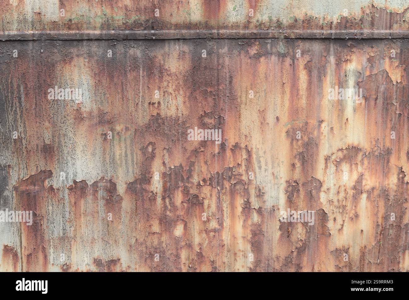 Old rusty metal surface with peeling paint and dirty streaks from rain ...