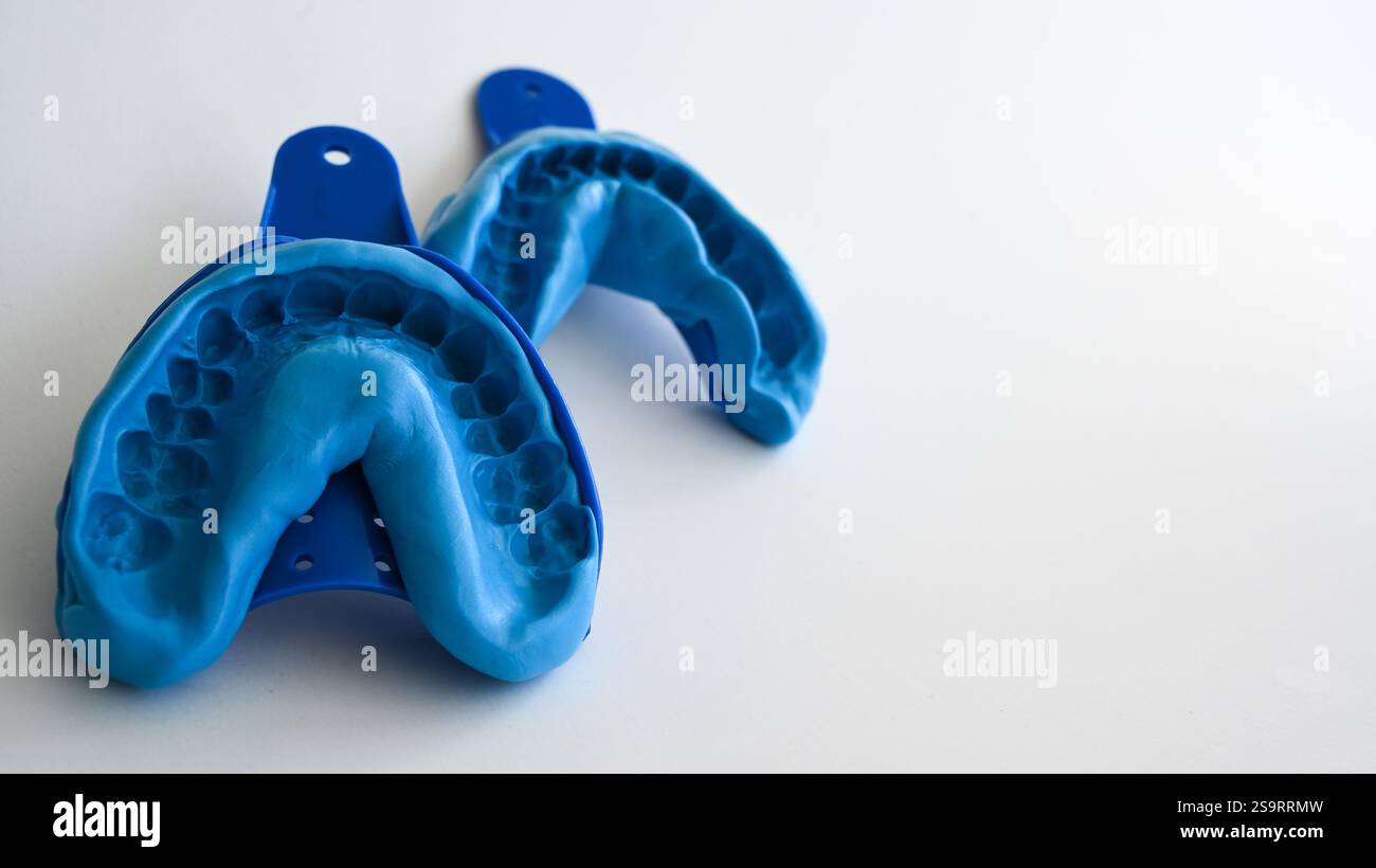 Close up of a dentist dental technique bite 3D impression teeth ...