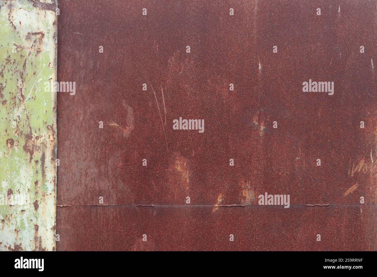 Old rusty metal surface with peeling paint and dirty streaks from rain ...