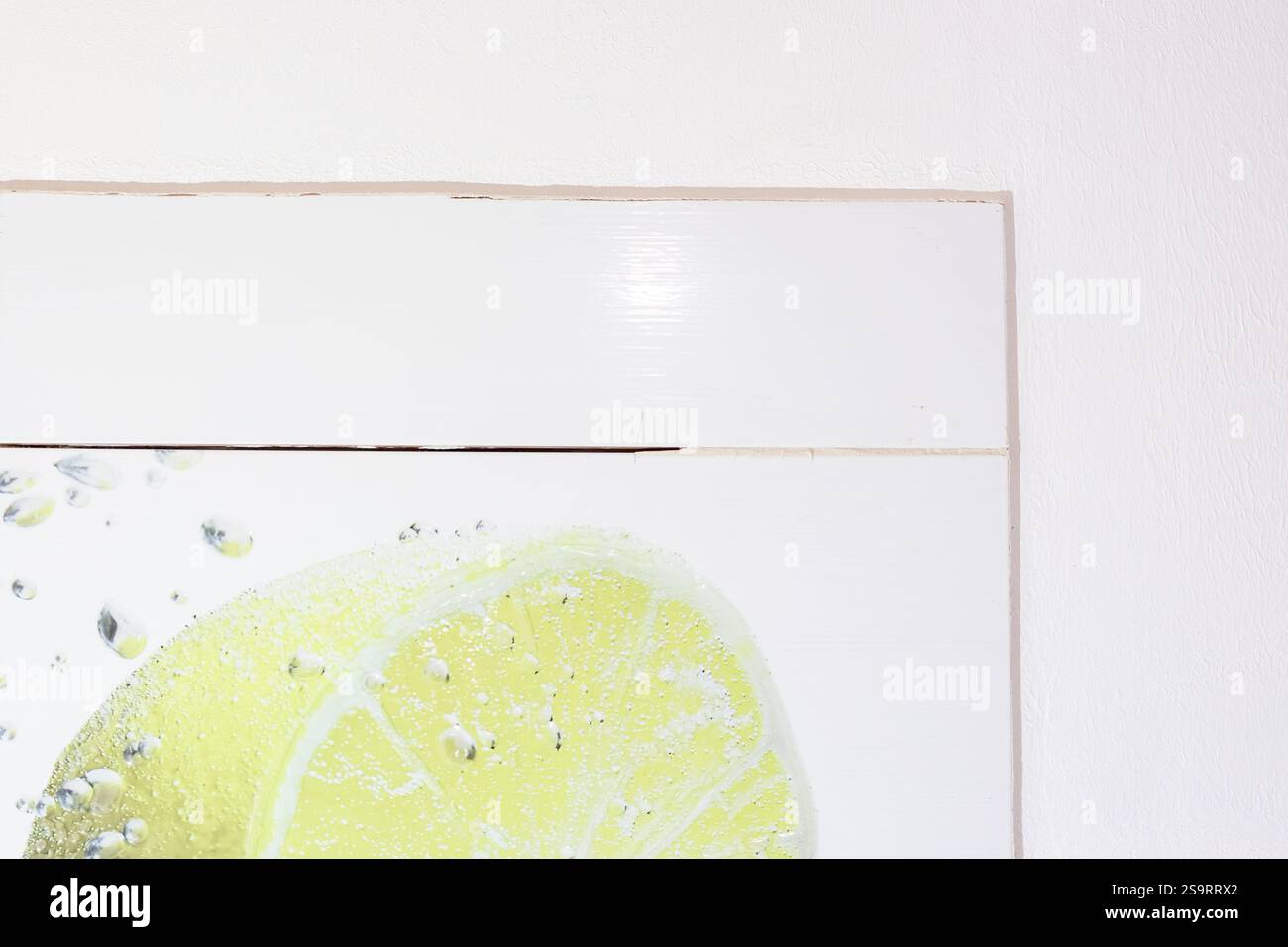 Laying ceramic tiles. Filling the joints between tiles with grout Stock ...