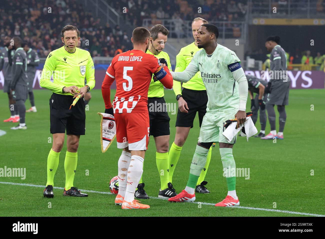 Milan, Italy. 22nd Jan, 2025. David Lopez of Girona FC and Mike Maignan ...