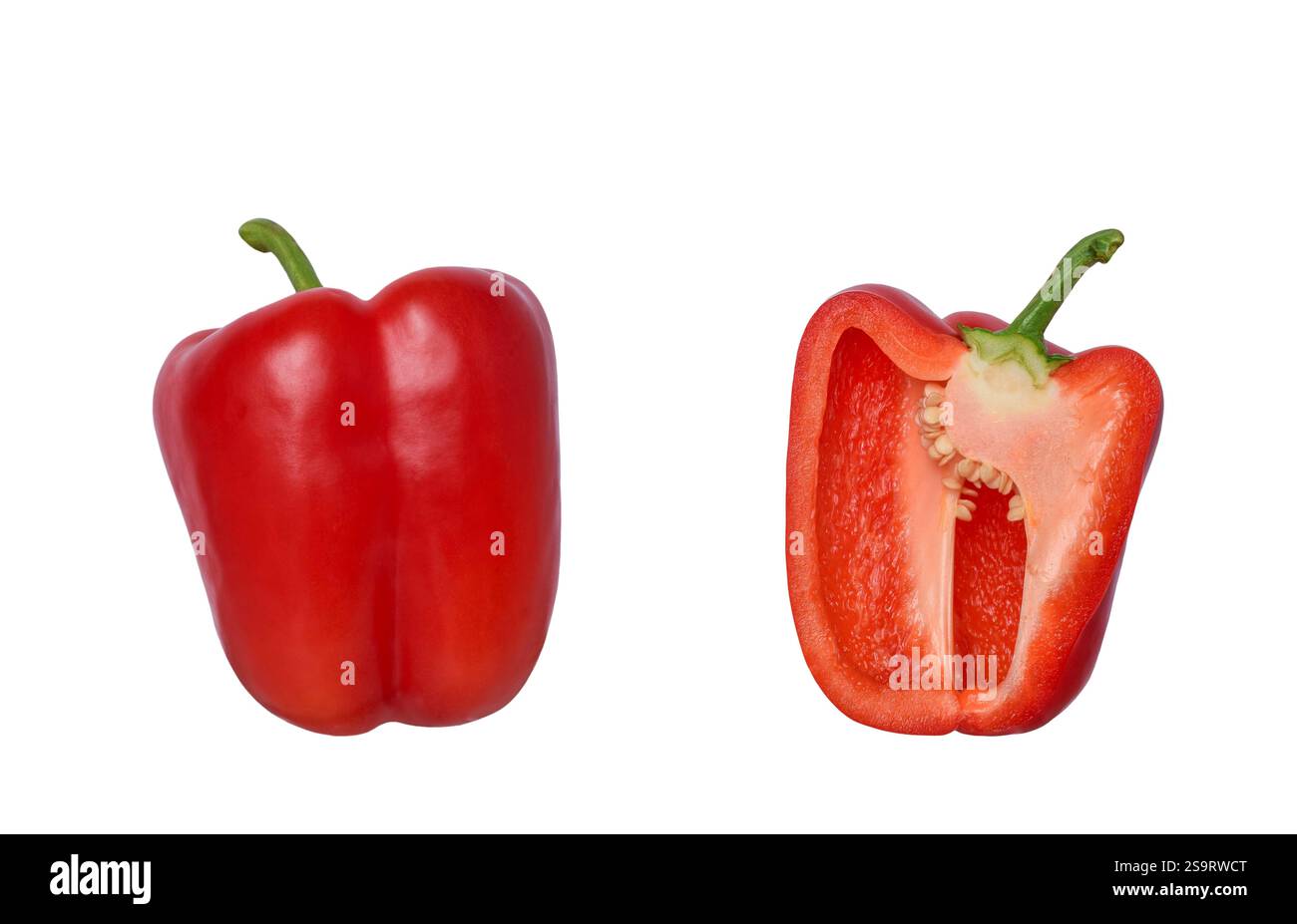 Whole and cut in half red bell pepper isolated cutout on white Stock ...