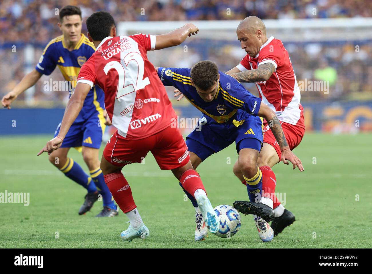Boca Juniors midfielder Camilo Rey Domenech 2nd R vies for the ball ...