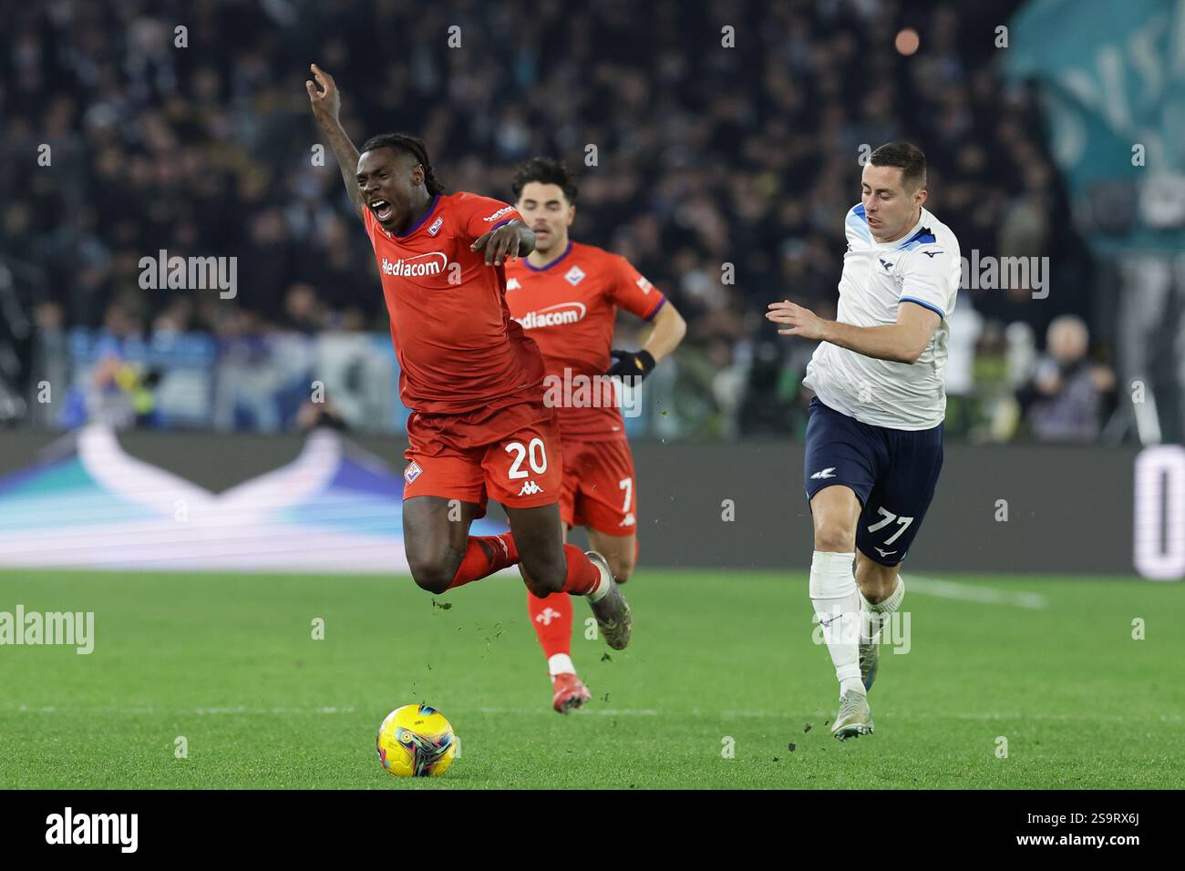 Fiorentina's Italian forward Moise Kean challenges for the ball with ...