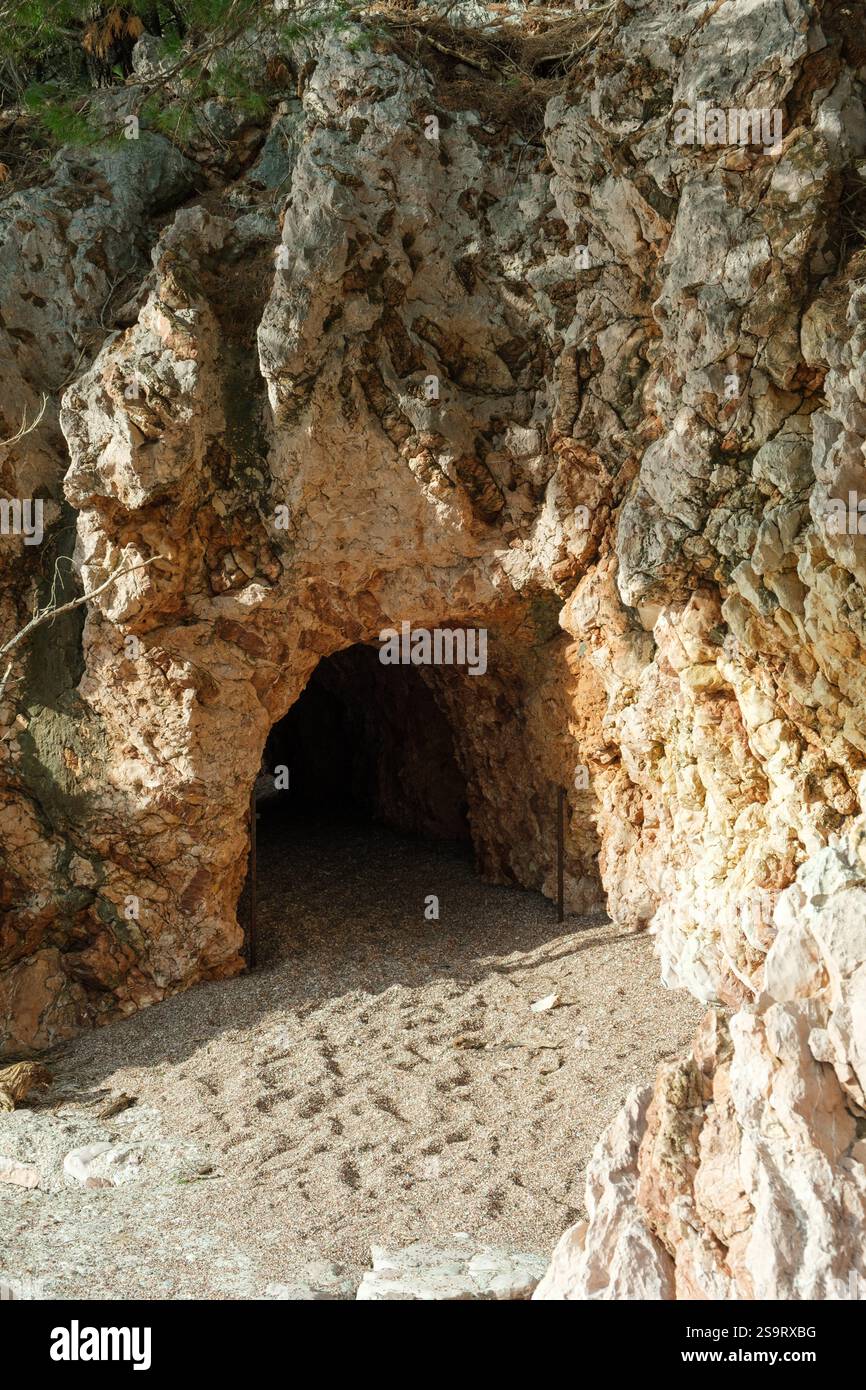 Rocky Cave Entrance with Pebble Floor Stock Photo - Alamy