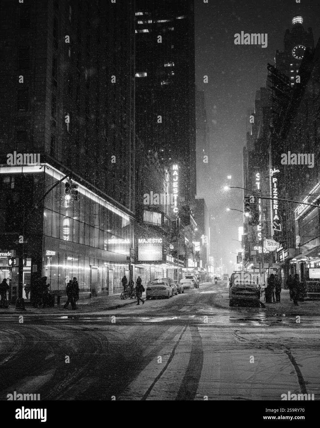 A snowy night in the Theater District, Midtown Manhattan, New York City ...