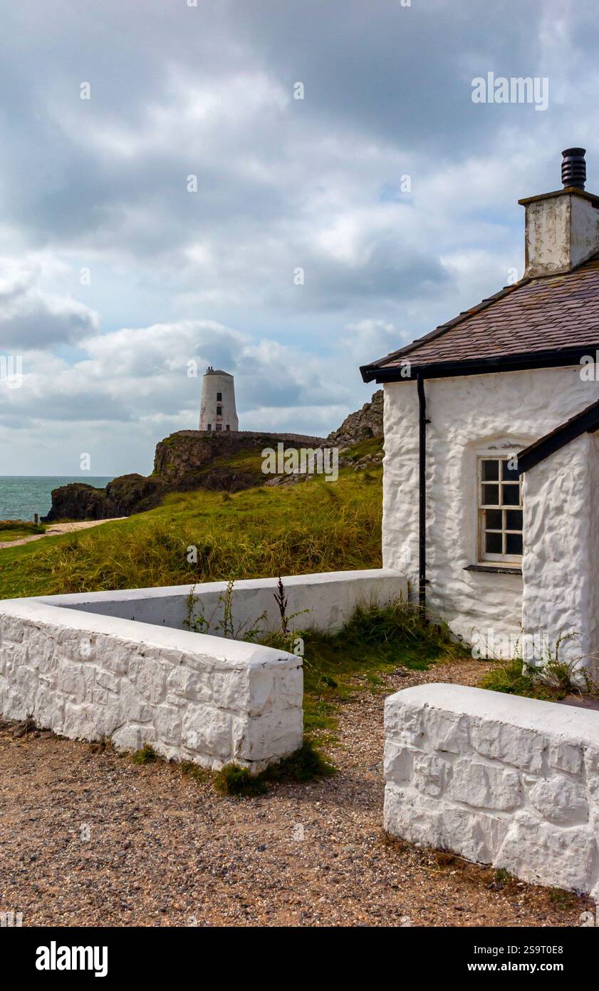 Traditional white painted cottages on the island of Ynys Llanddwyn off ...