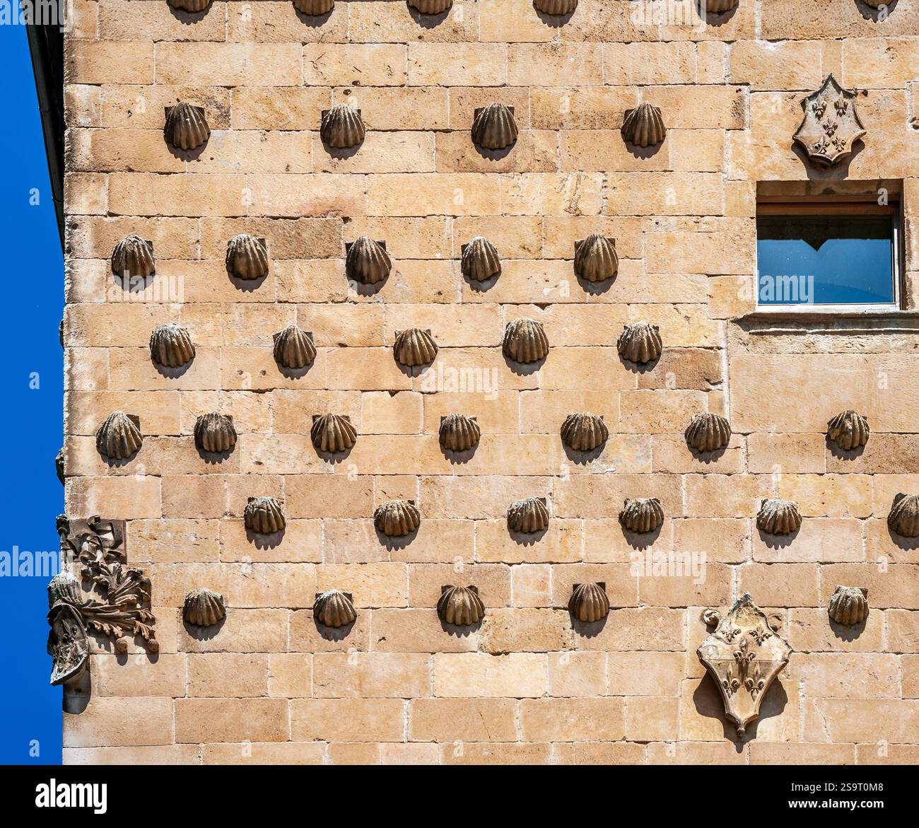 Architectural detail of Casa de las Conchas facade adorned with shell ...