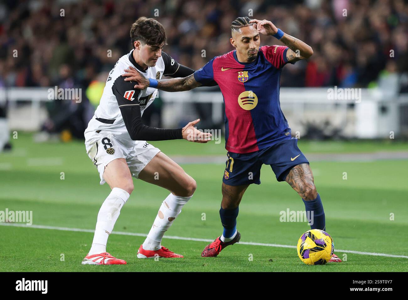 Barcelona, Spain. 26th Jan, 2025. Raphinha (11) of FC Barcelona and ...