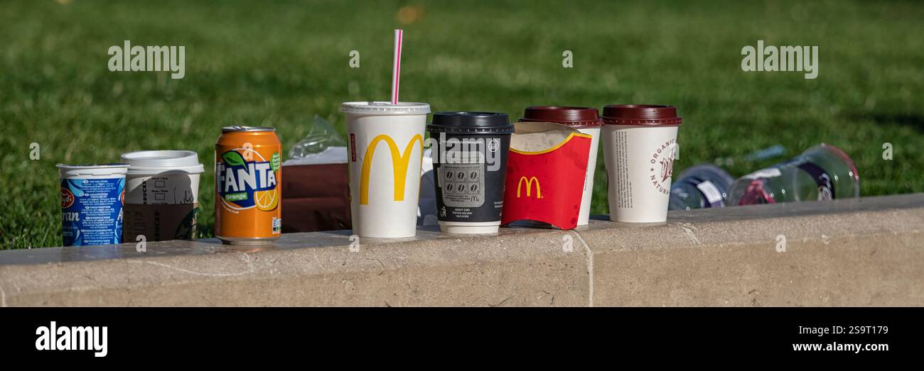 LONDON, UK - SEPTEMBER 29, 2018: Panorama of cans and empty cup litter ...