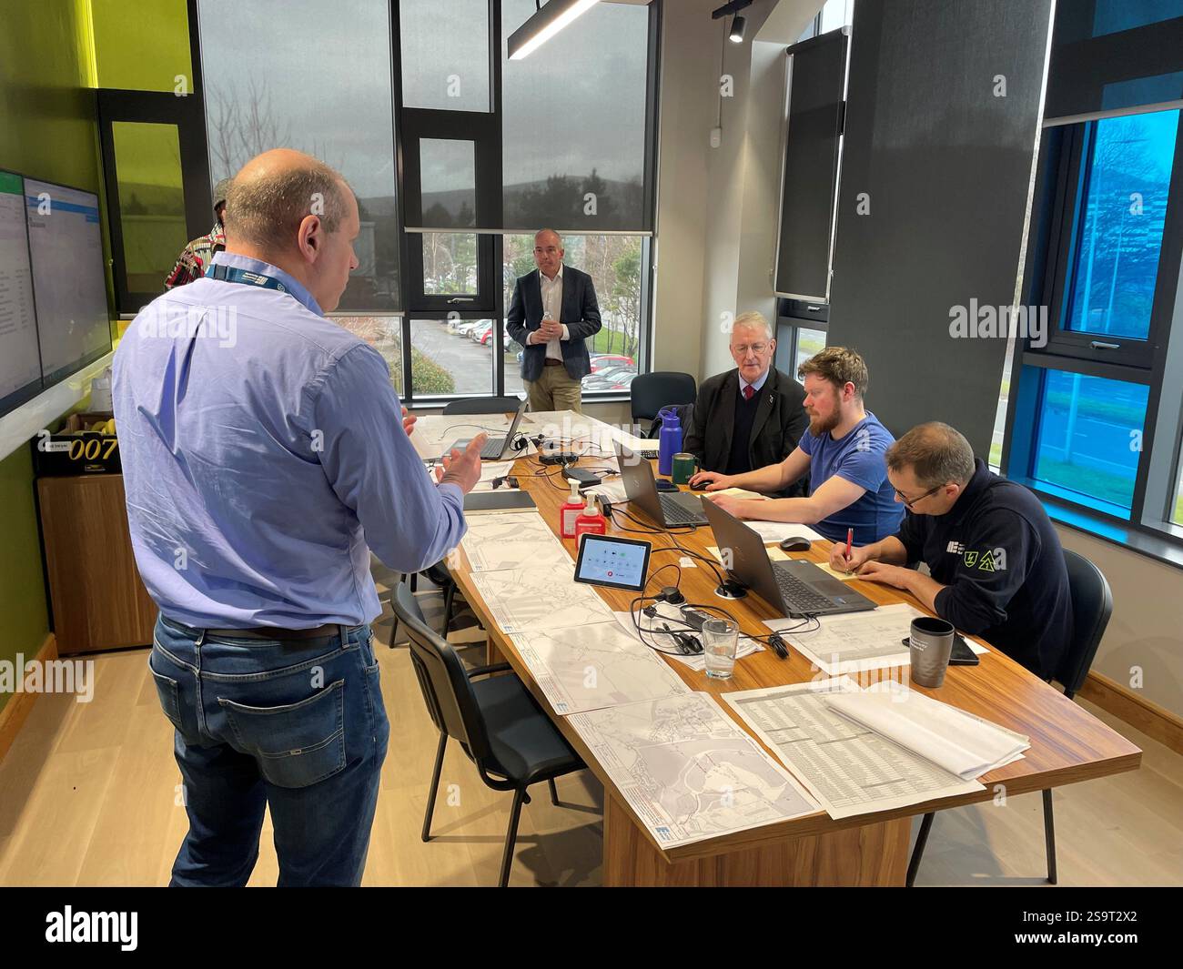 NI Secretary Hilary Benn (3rd right) during his visit to NIE Networks ...