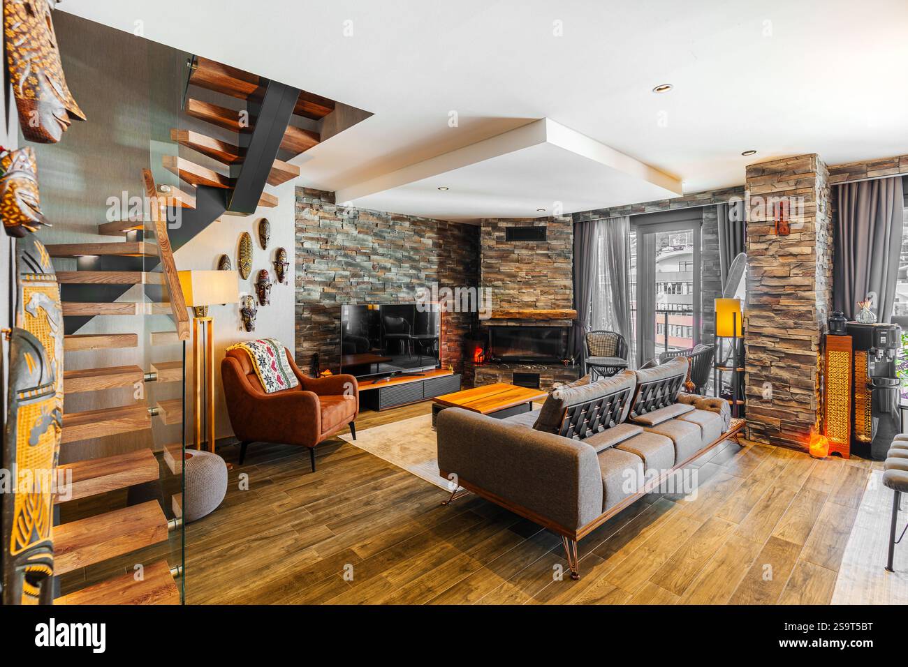 A wide angle view of a luxurious living room, showing the unique ...