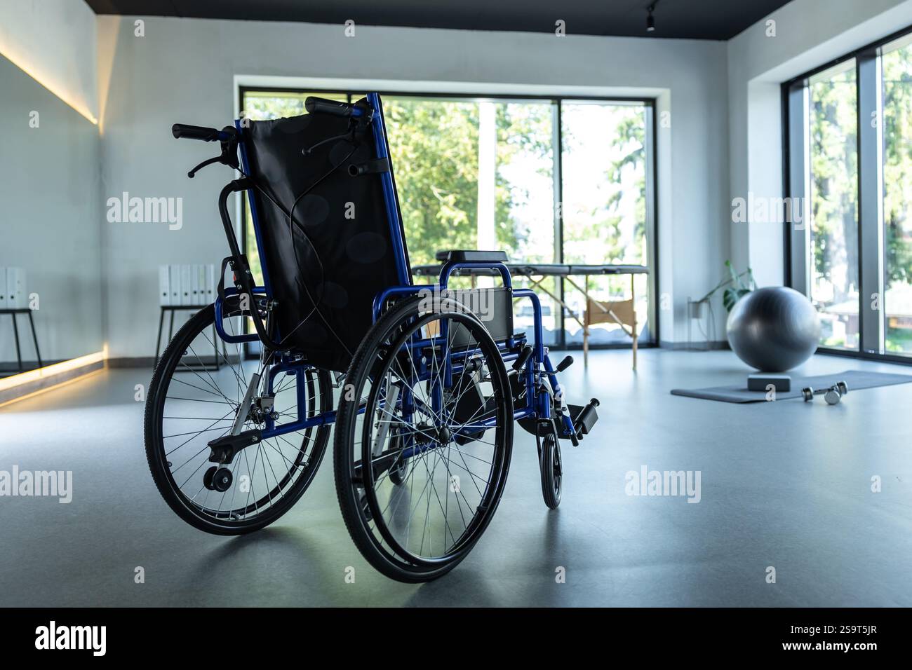Hospital room with windows equipped for physiotherapy sessions and ...