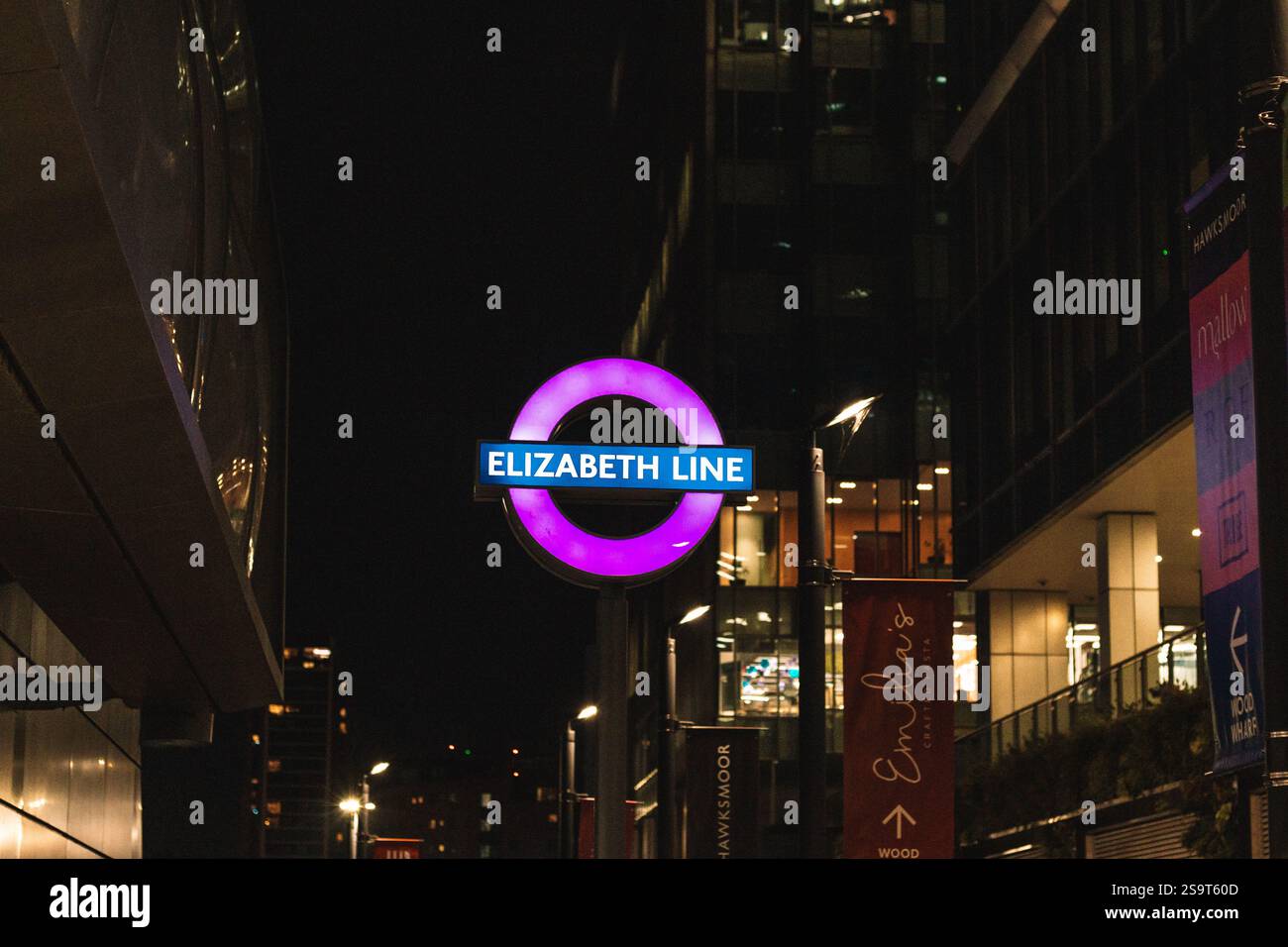 The underground sign of the Elizabeth line at night - stretches for ...