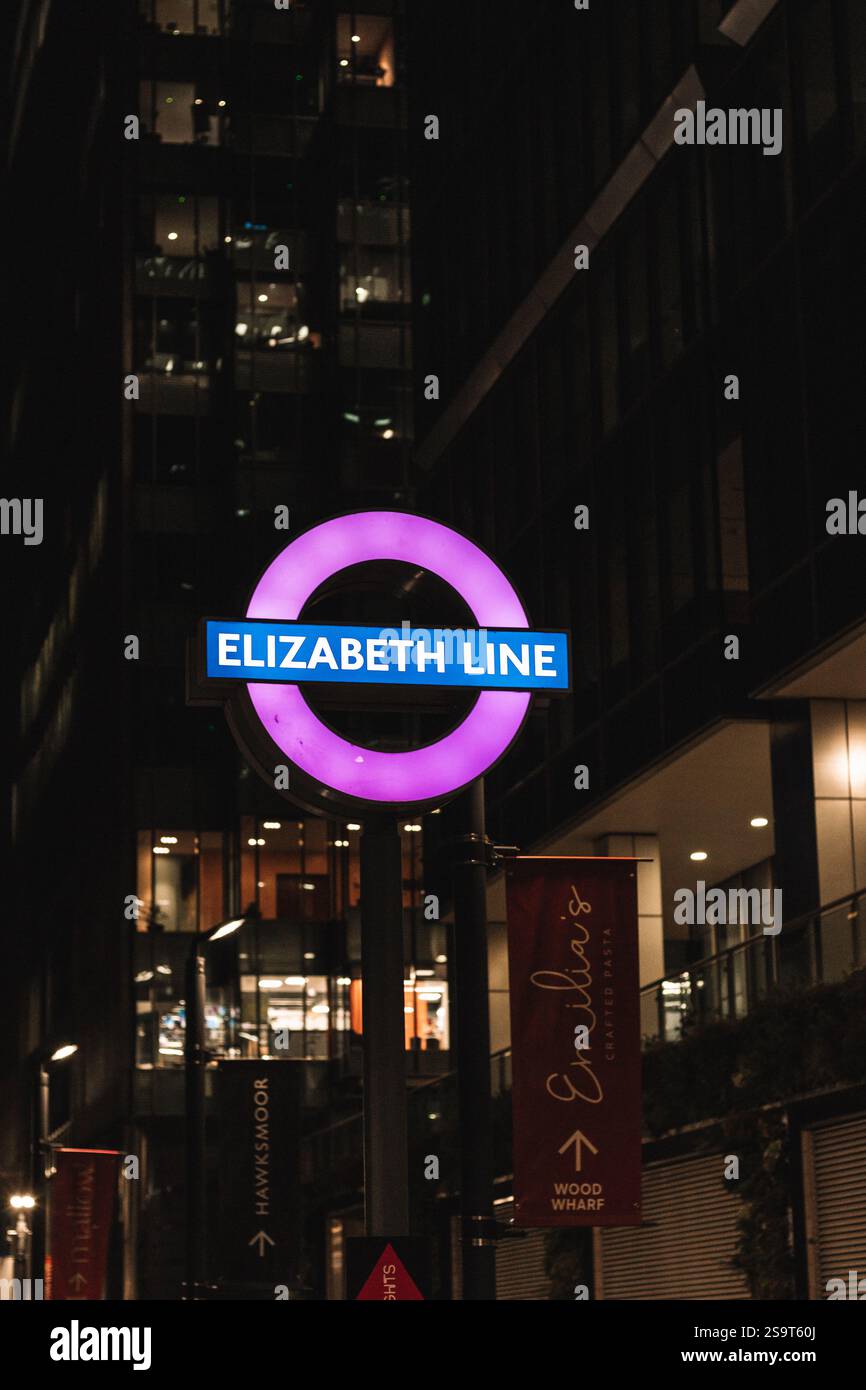 The underground sign of the Elizabeth line at night - stretches for ...