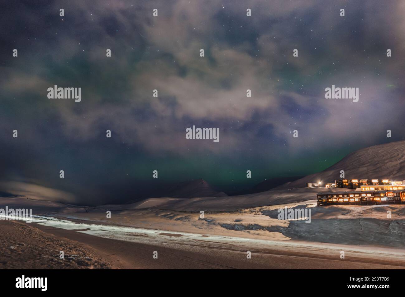 Aurora borealis above the northernmost town in the world, Longyearbyen ...