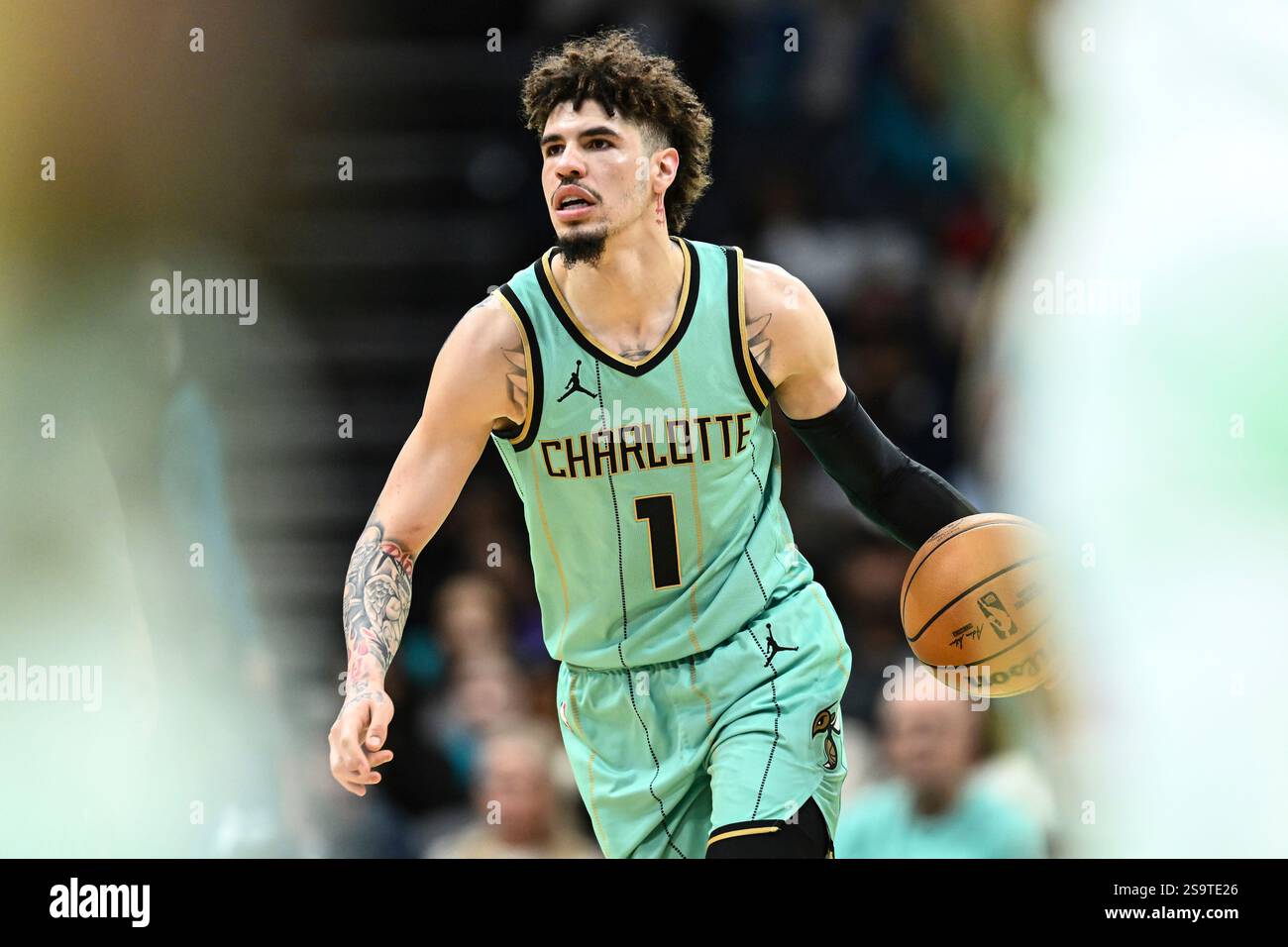 Charlotte Hornets guard LaMelo Ball (1) brings the ball upcourt during ...