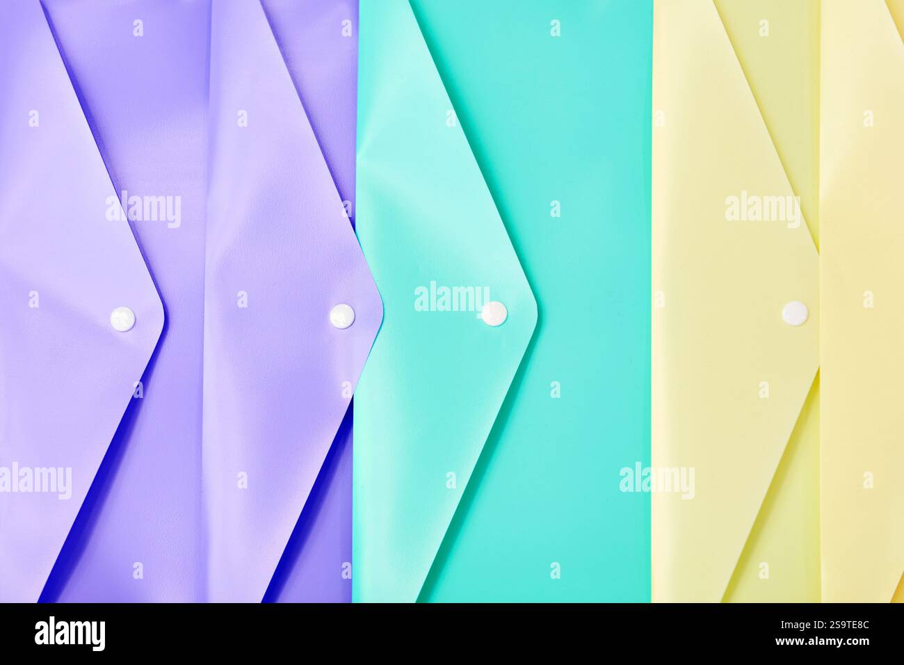 Colored plastic folder for papers in the stationery store Stock Photo ...