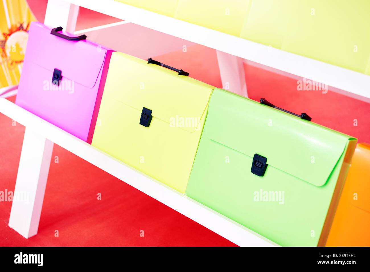 Colored plastic folder for papers in the stationery store Stock Photo ...