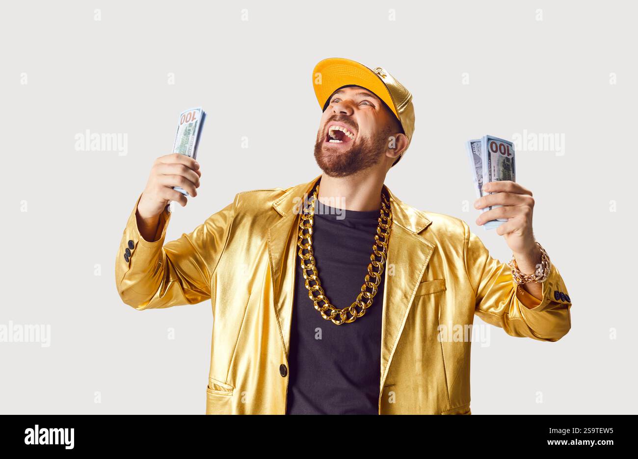 Happy rich amazed young hi-res stock photography and images - Alamy