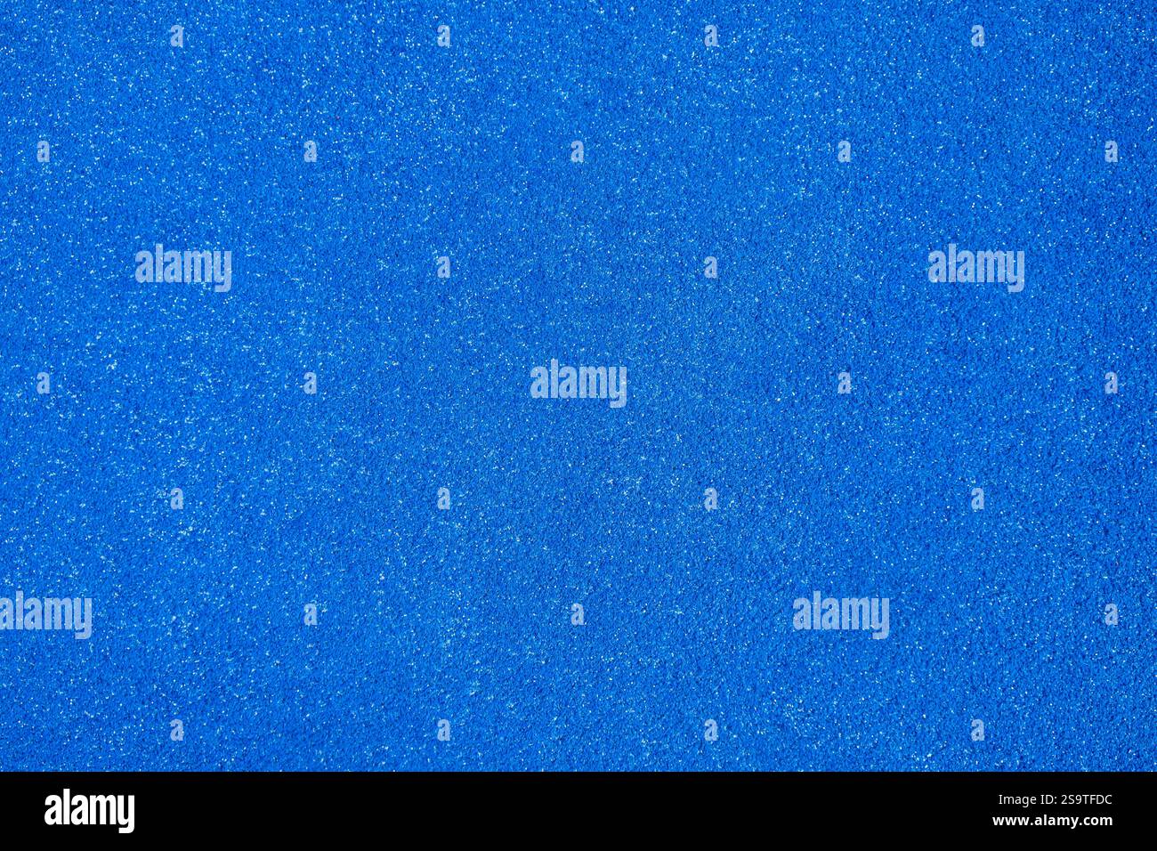 texture of the surface of a blue paddle tennis court, textured ...