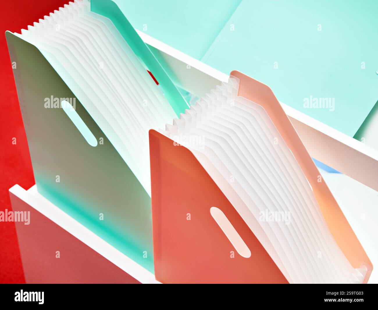 Colored plastic folder for papers in the stationery store Stock Photo ...