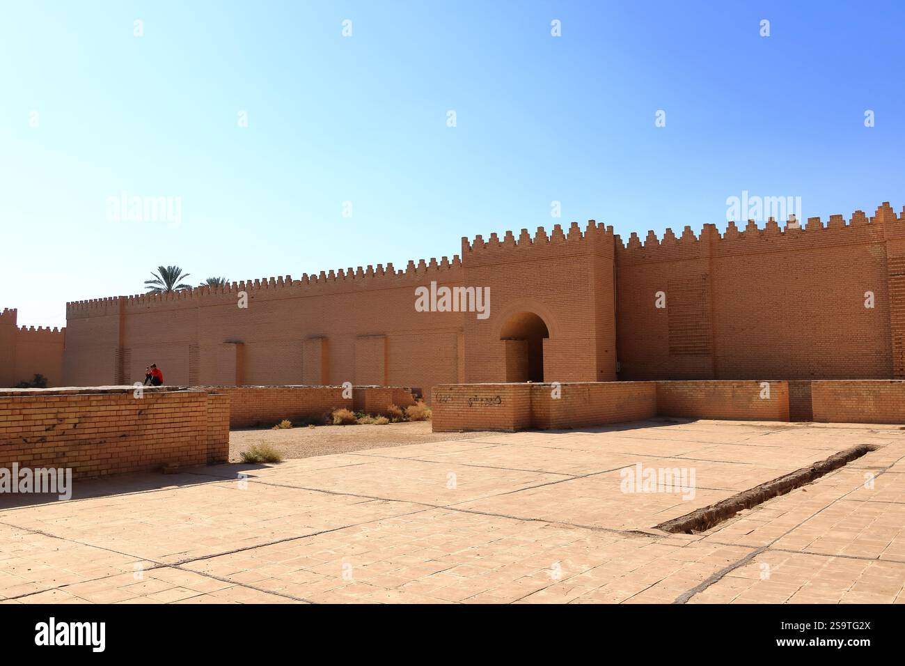 Babylon in Iraq - November 13 2024: people visit the old walls of the ...