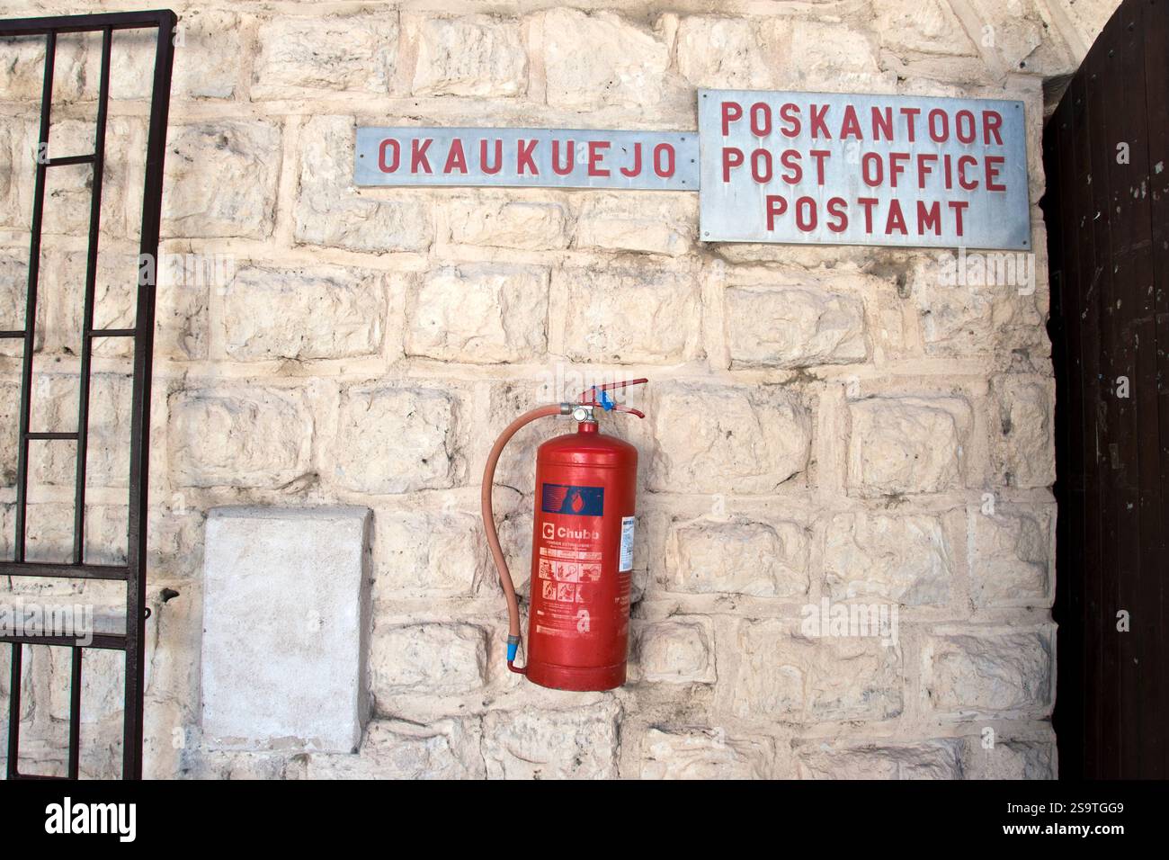 A post office sign in Afrikaans, English and German at the Andersson ...