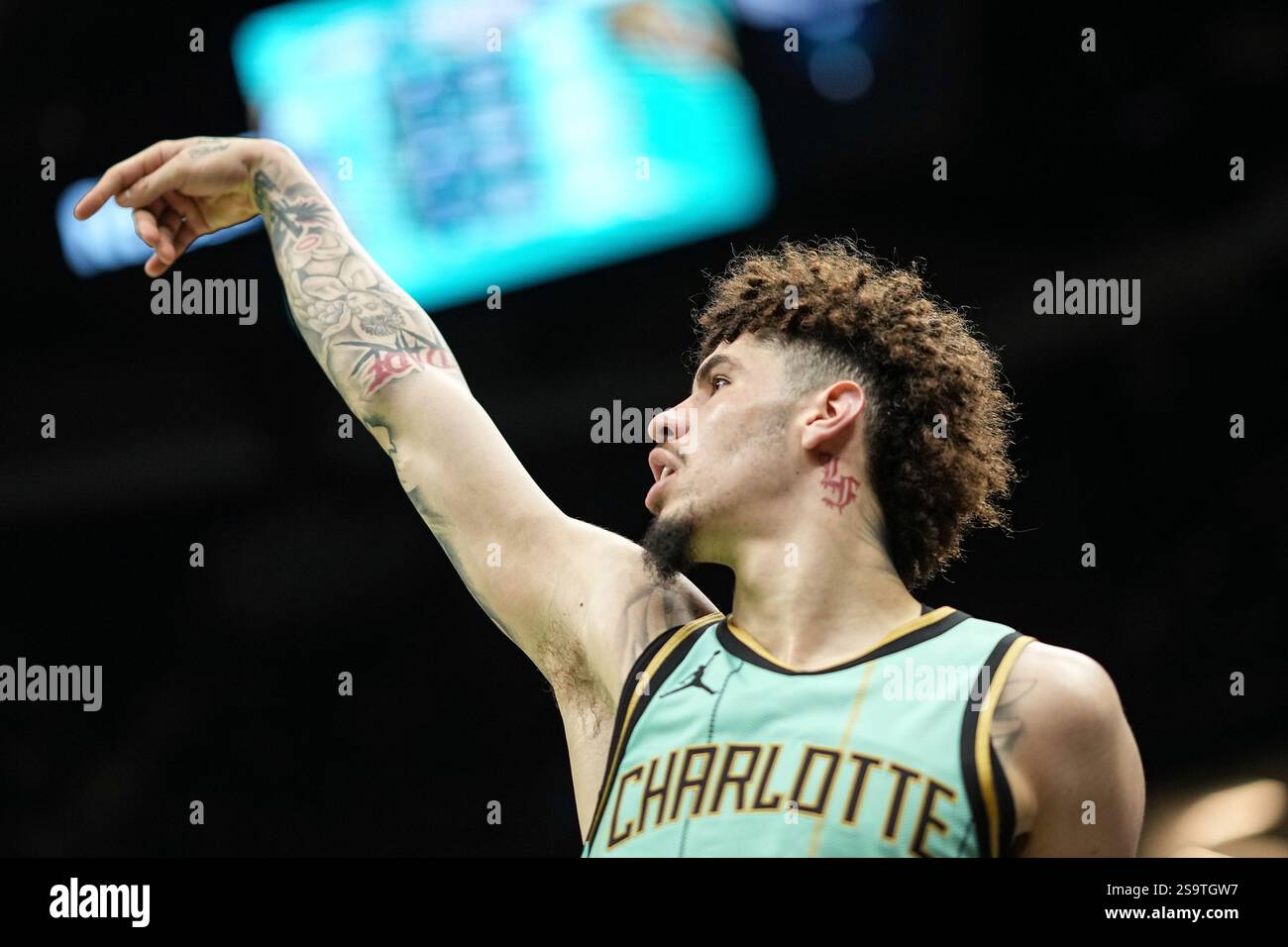 Charlotte Hornets guard LaMelo Ball follows through after shooting a ...
