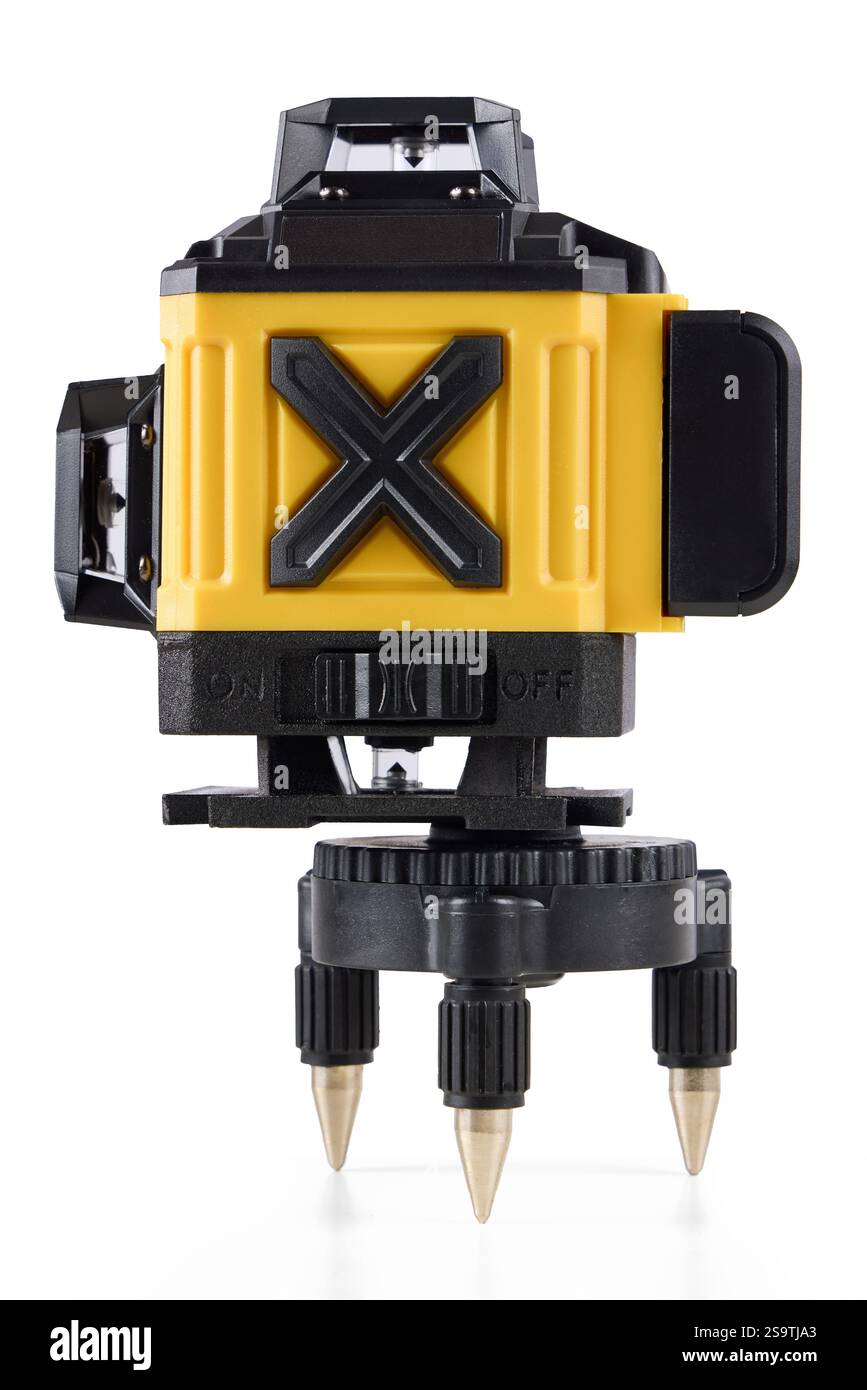 A yellow and black laser level device with an "X" on its front, mounted ...