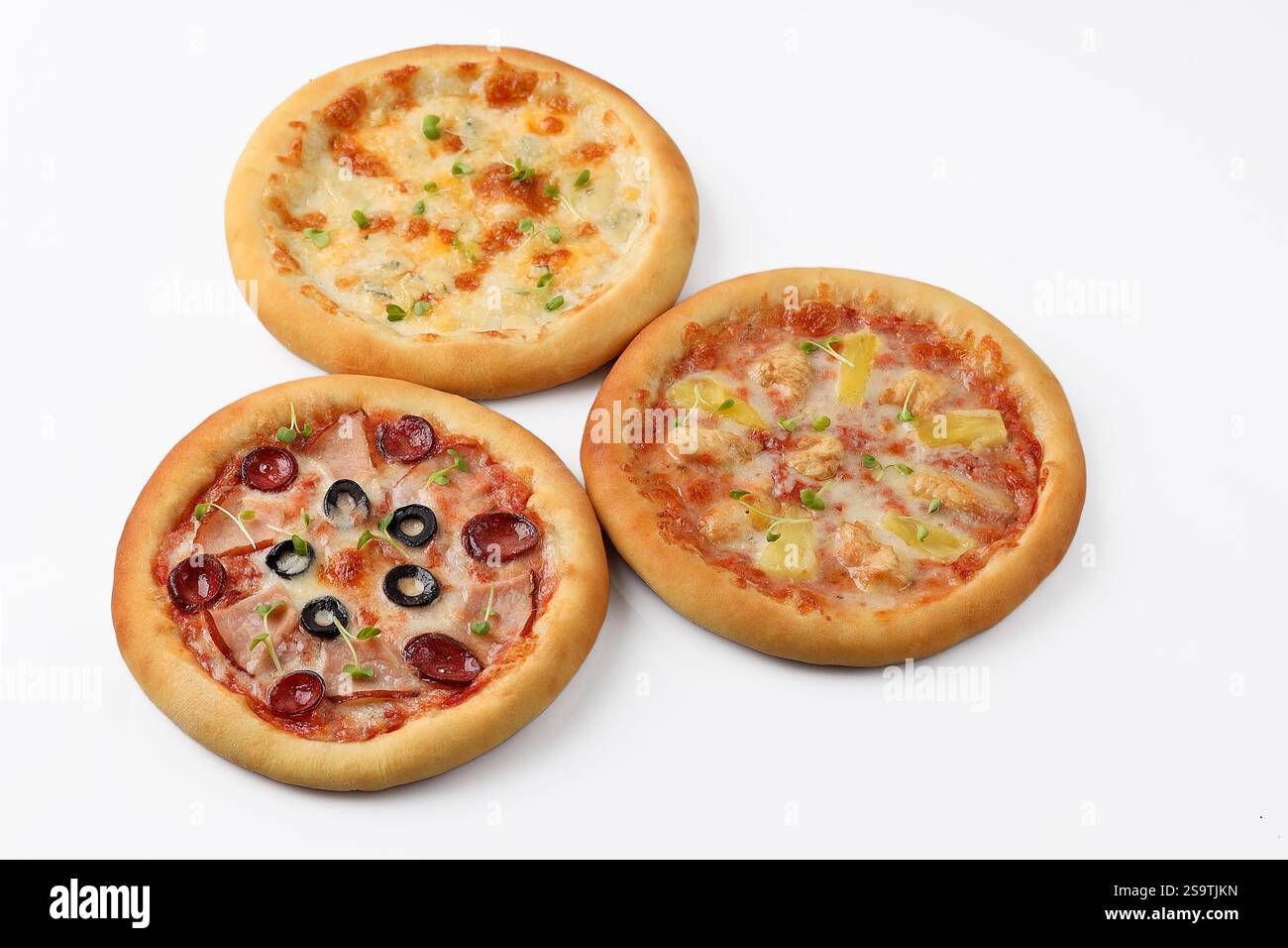 Three popular mini pizzas on a white background. isolate. Fast food for ...