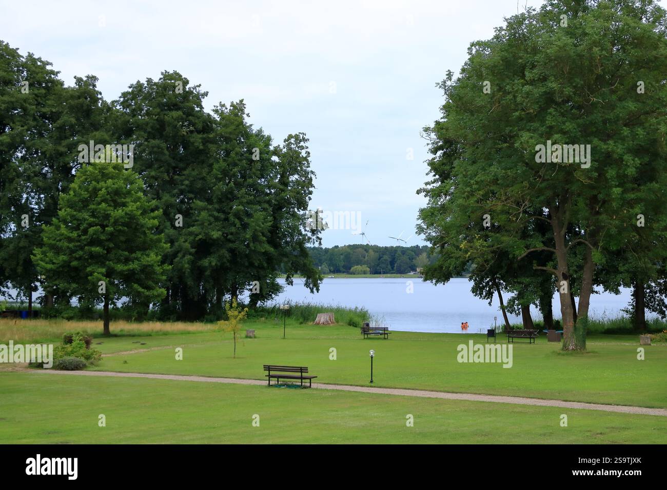 Wandlitz, Brandenburg, Germany - July 26 2024: people enjoy the shore ...