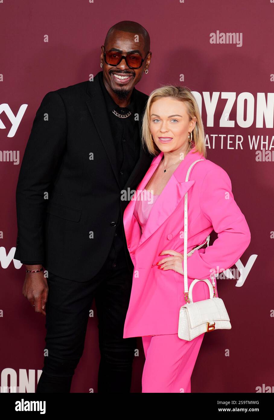 Ben Ofoedu (left) and guest attending the world premiere of Boyzone No ...