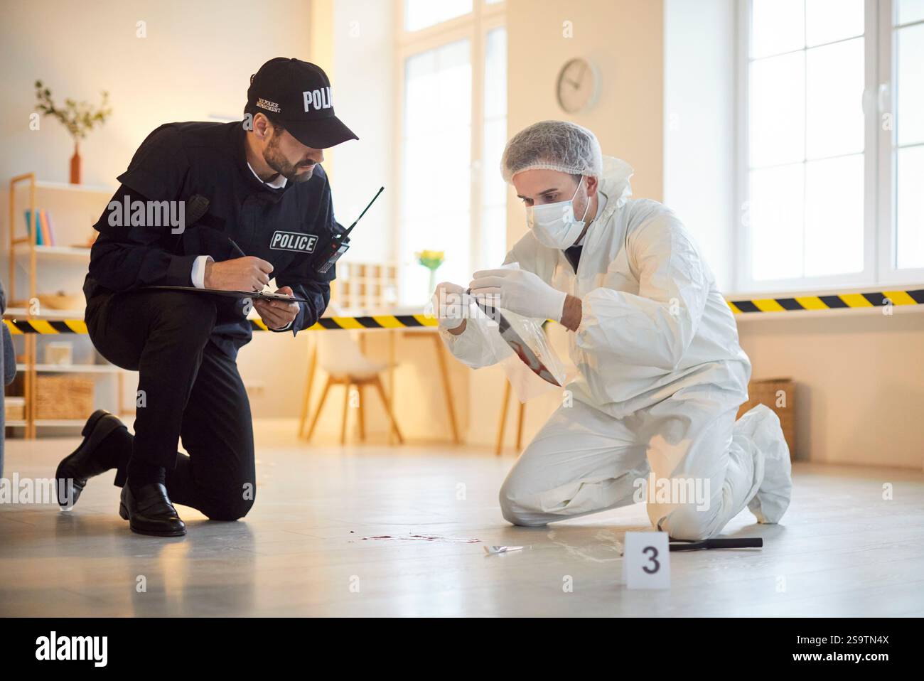 Police officer and forensic expert experting place of murdering Stock ...