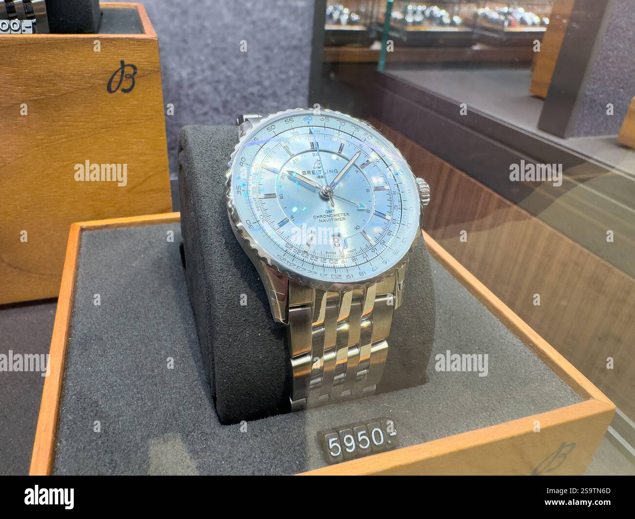 Unique timepiece displayed in an elegant watch showcase at a boutique ...