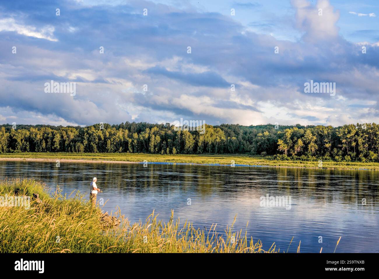Kemerovo, Russia, 13 Jule 2017, Man fisherman with fishing rod fishing ...