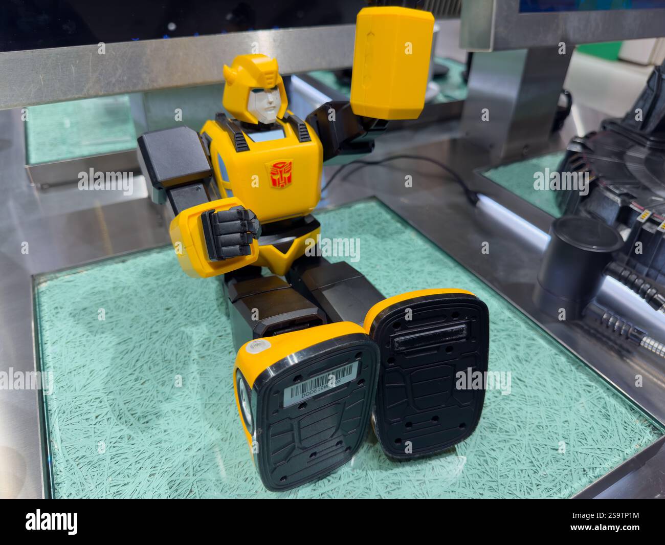 Transforming action figure greets visitors at a technology showcase ...