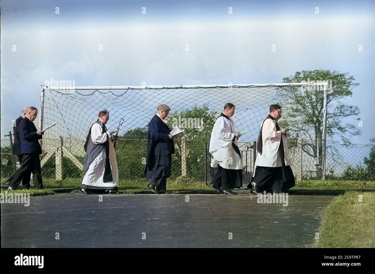 Members of the clergy and officals consecrating a burial ground on a ...
