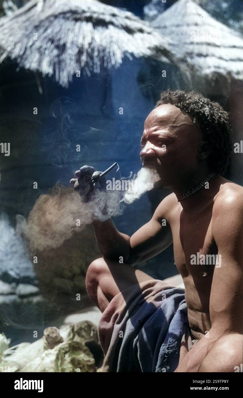 African native man smoking pipe 1949 Stock Photo - Alamy