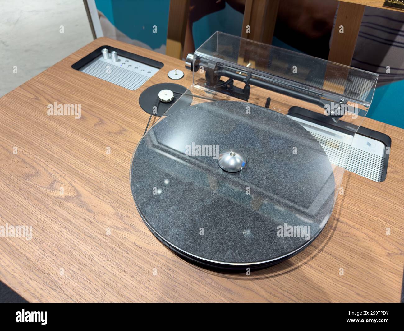 Discovering the elegance of a vintage turntable at a modern design expo ...