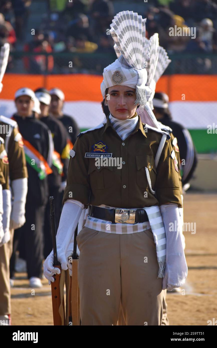 Srinagar, India. 26th Jan, 2025. A woman Kashmir Police taking part during the the 76th Republic ...