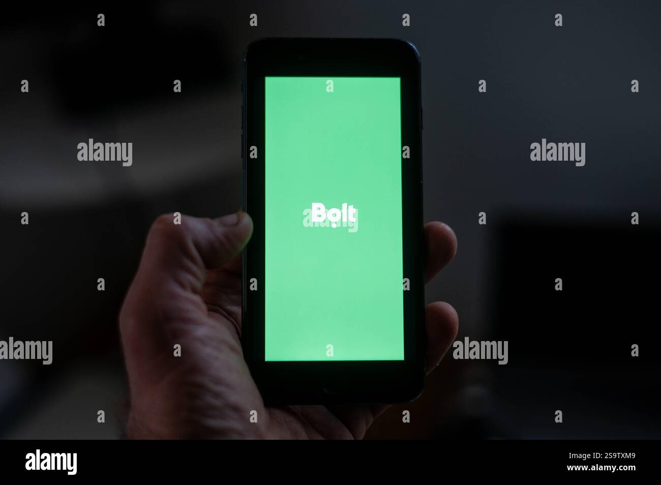 A person is opening Bolt ride app on a phone Stock Photo - Alamy