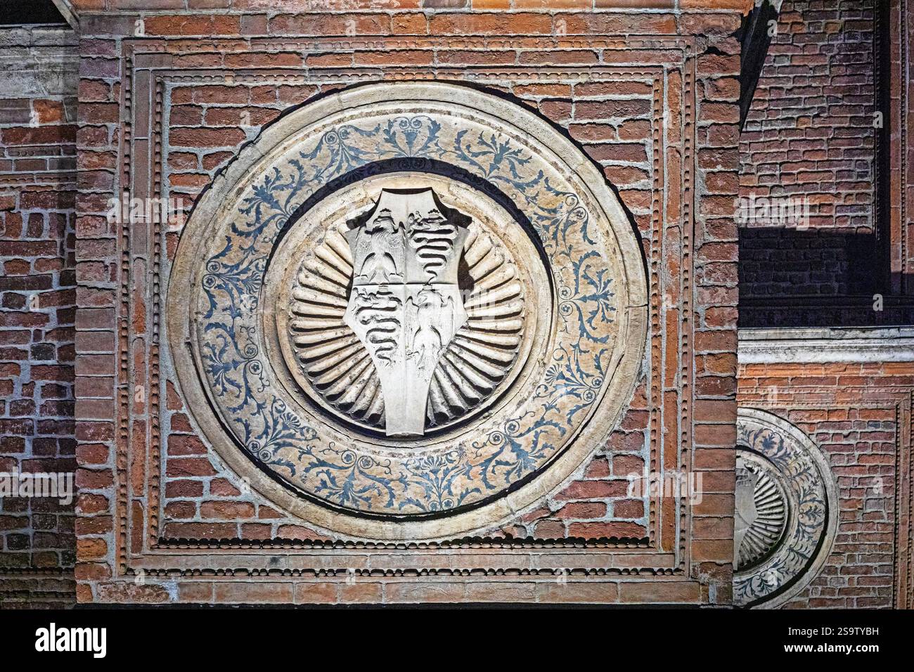 round beautiful italian bas-relief with symbols Stock Photo - Alamy